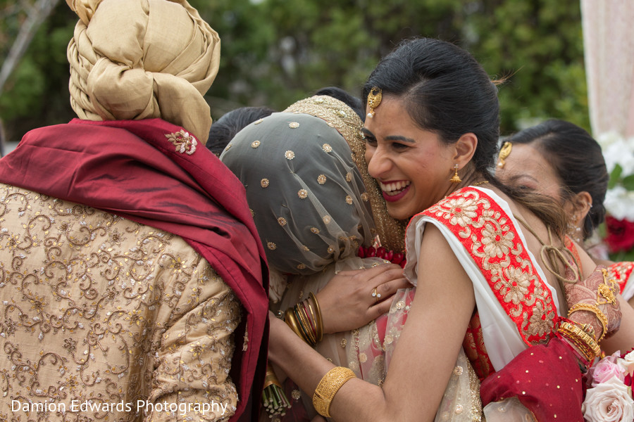 Lovely indian bridesmaids hugging the bride photography at wedding ...