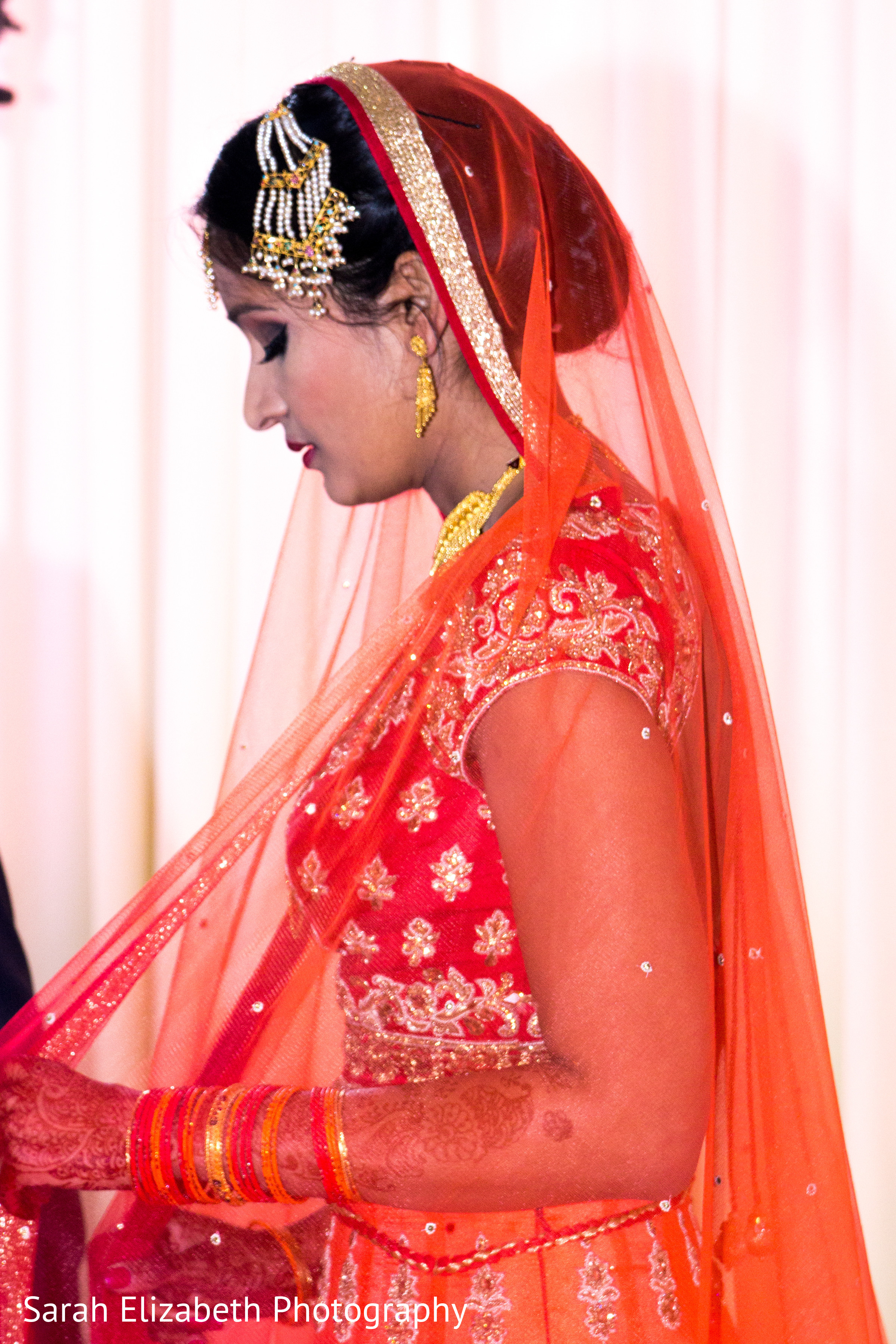 See this lovely indian bride in red and gold lengha | Photo 129041