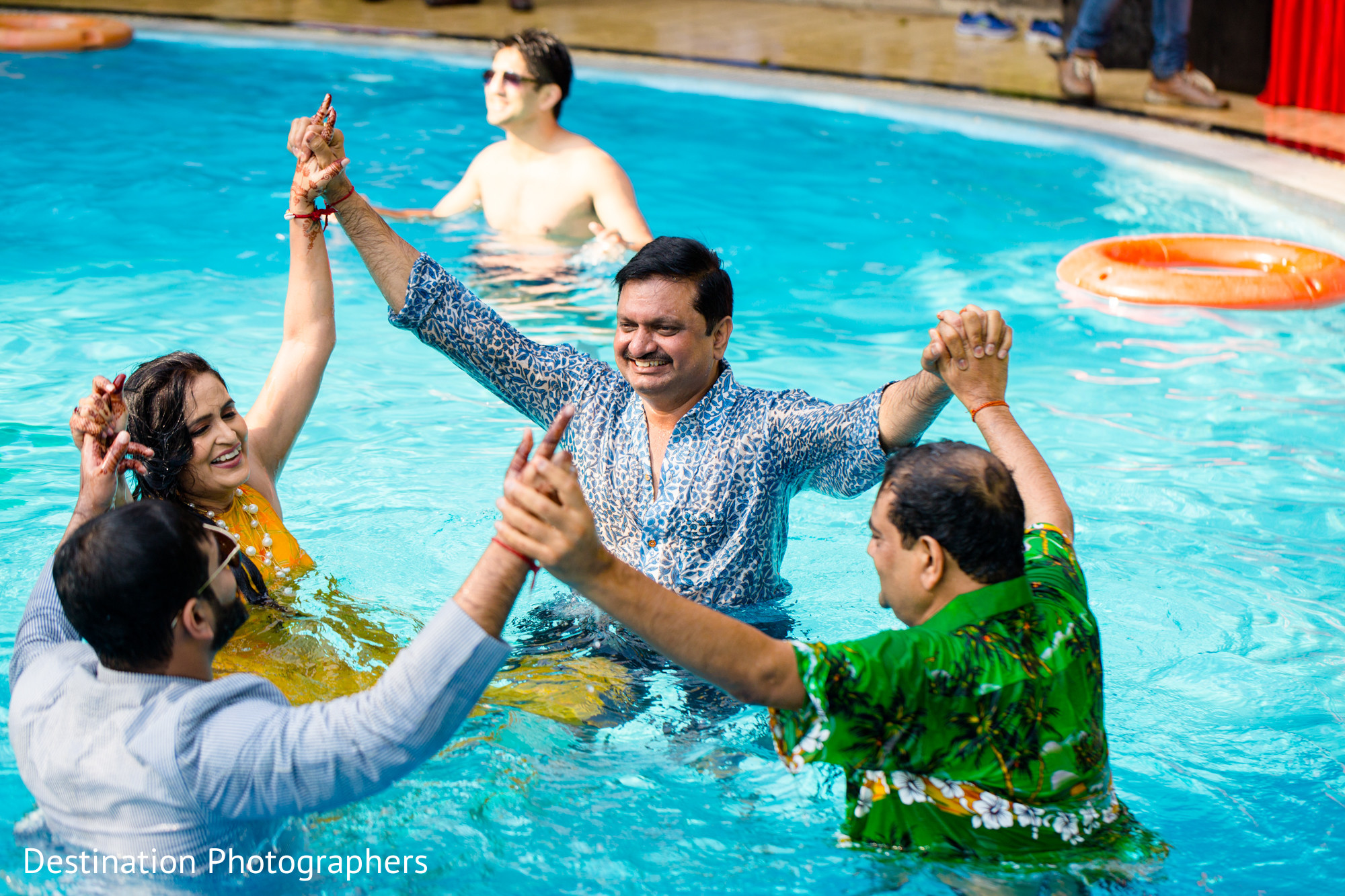 Indian wedding guests enjoying pre-wedding pool party | Photo 178926