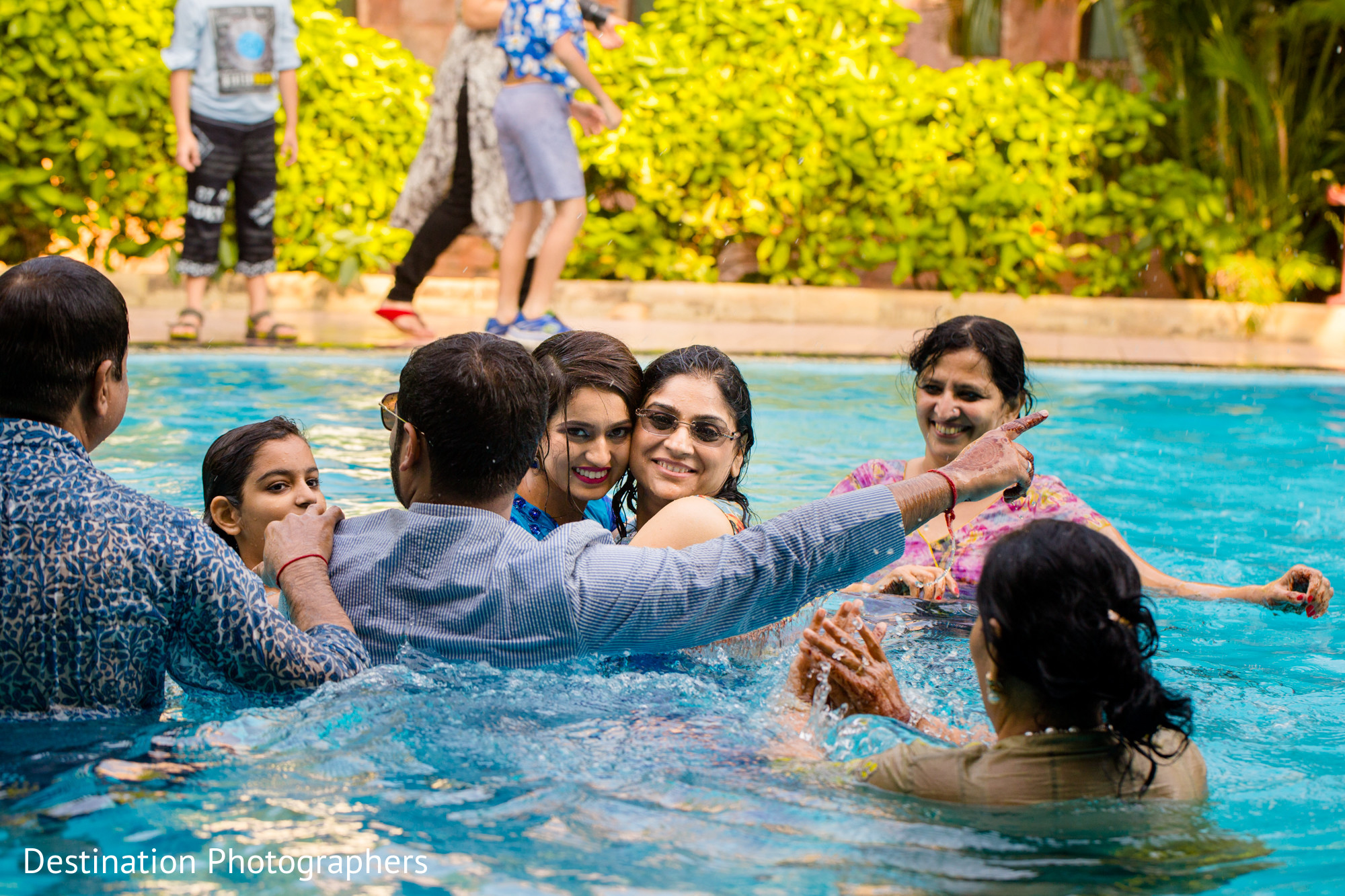 Indian wedding guests inside swimming pool | Photo 178927