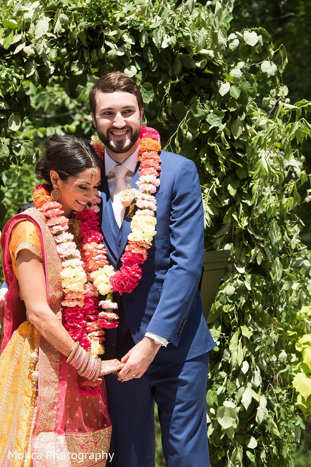 Indian bride and groom with garlands capture. | Photo 183314