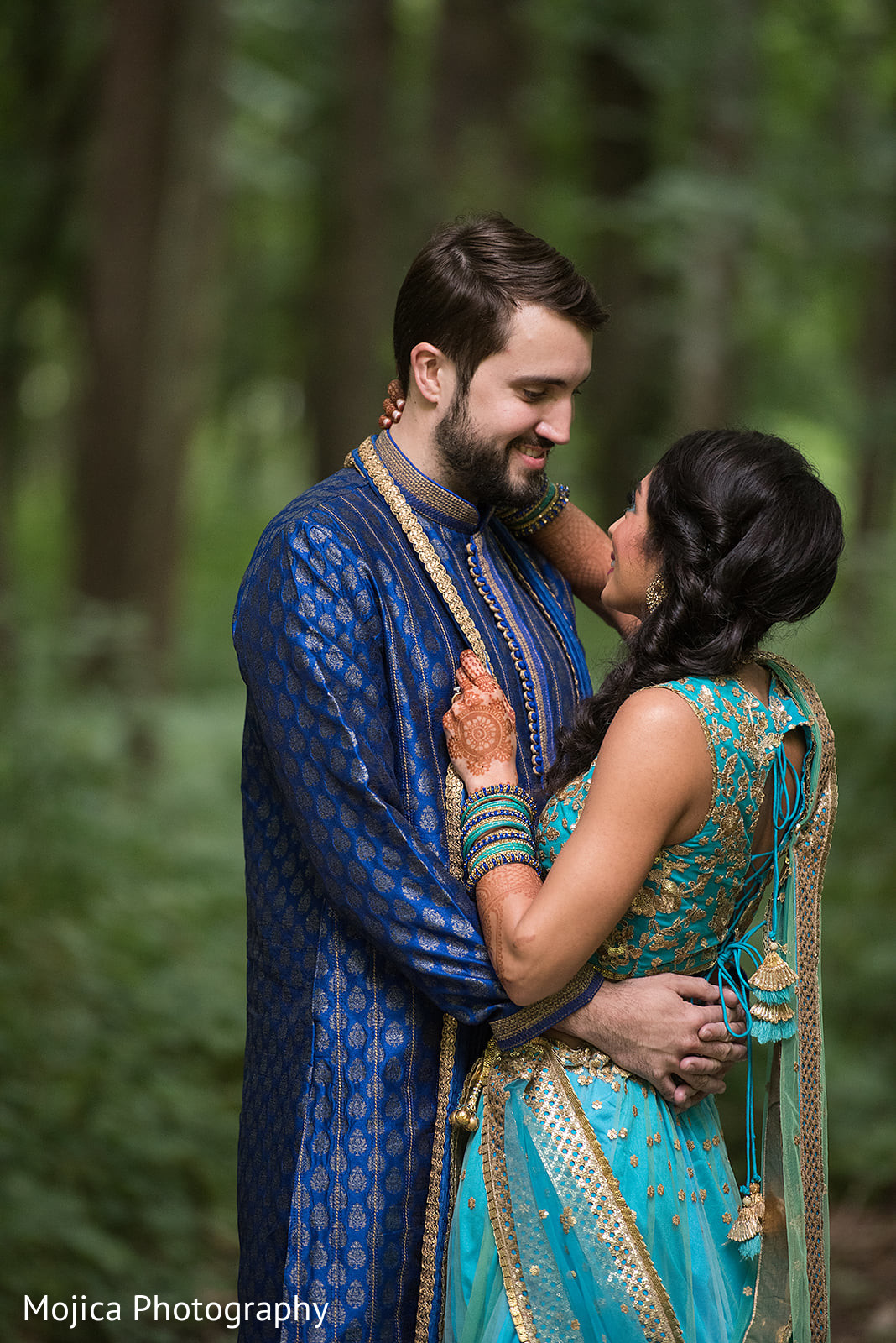 Indian bride and groom hugging each other portrait. | Photo 183427
