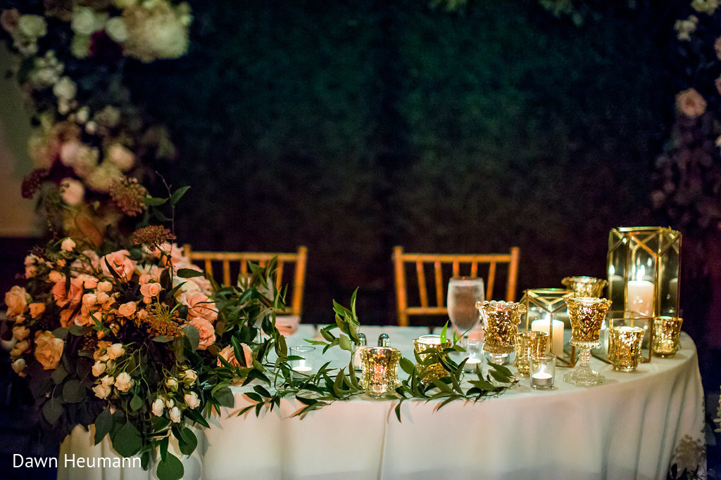 Dreamy Indian bride and groom reception table set up. | Photo 185017