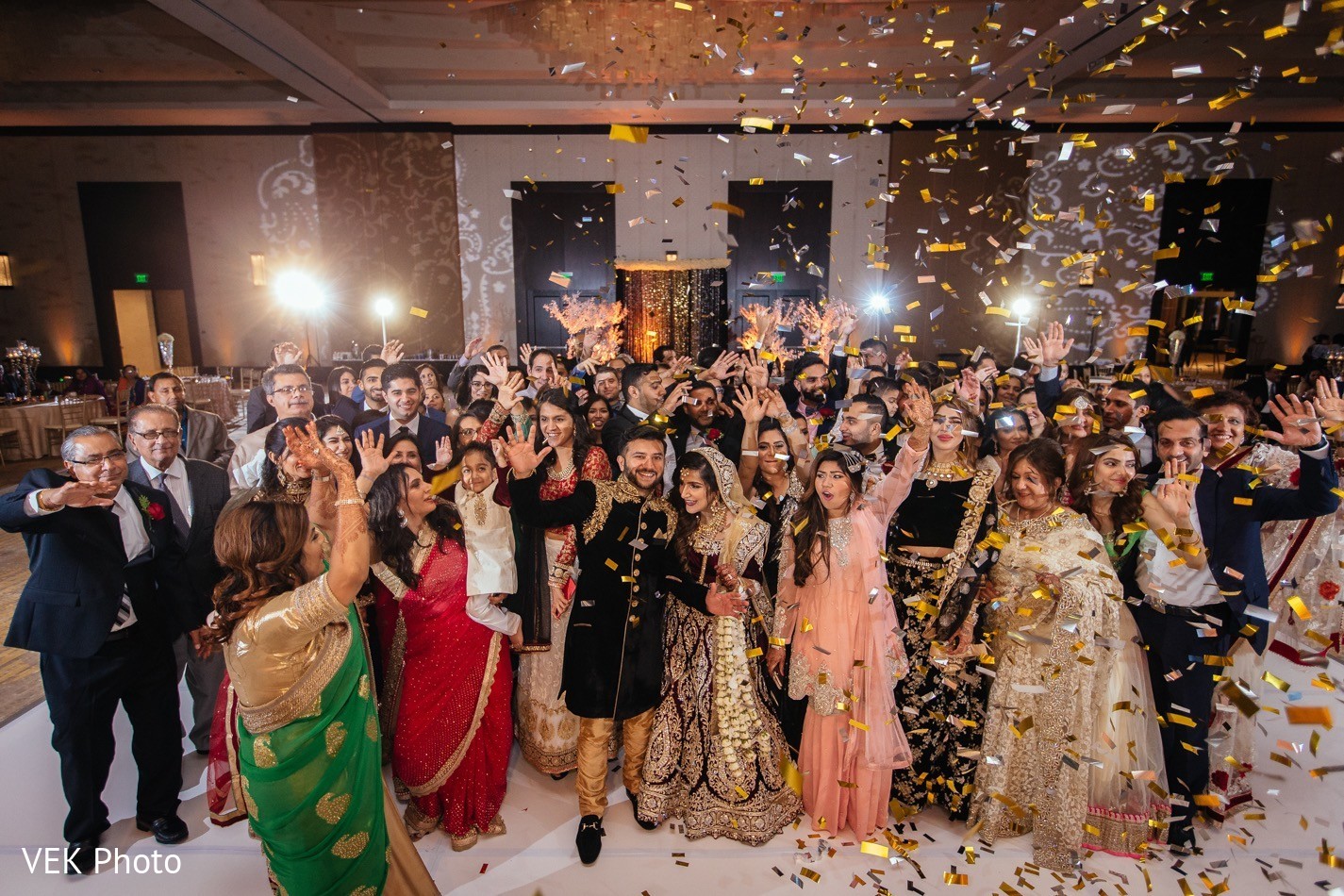 Colorful capture of the dancing guests at the reception. | Photo 187882