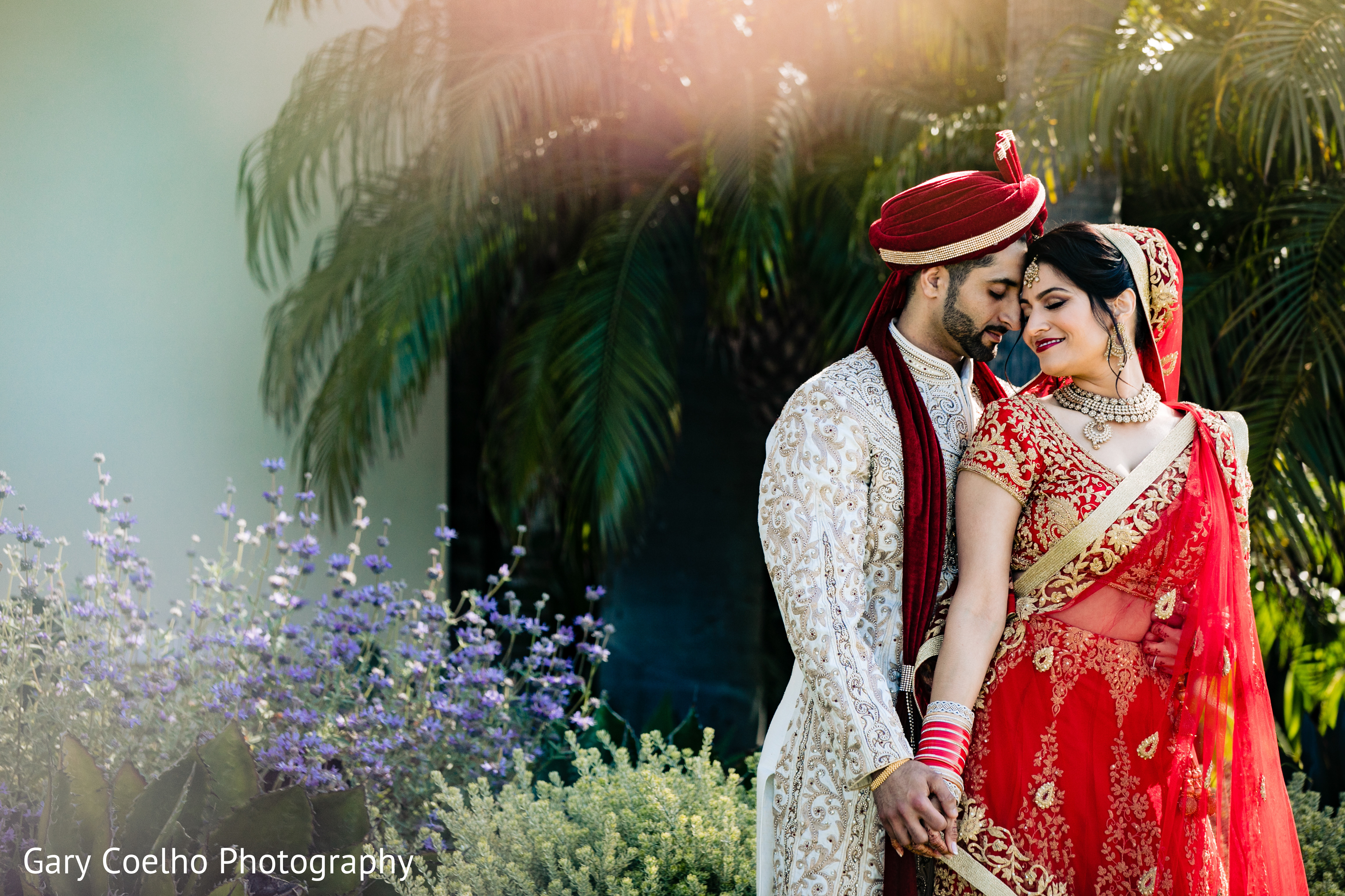 Joyful Indian bride and groom holding hands capture. | Photo 189429