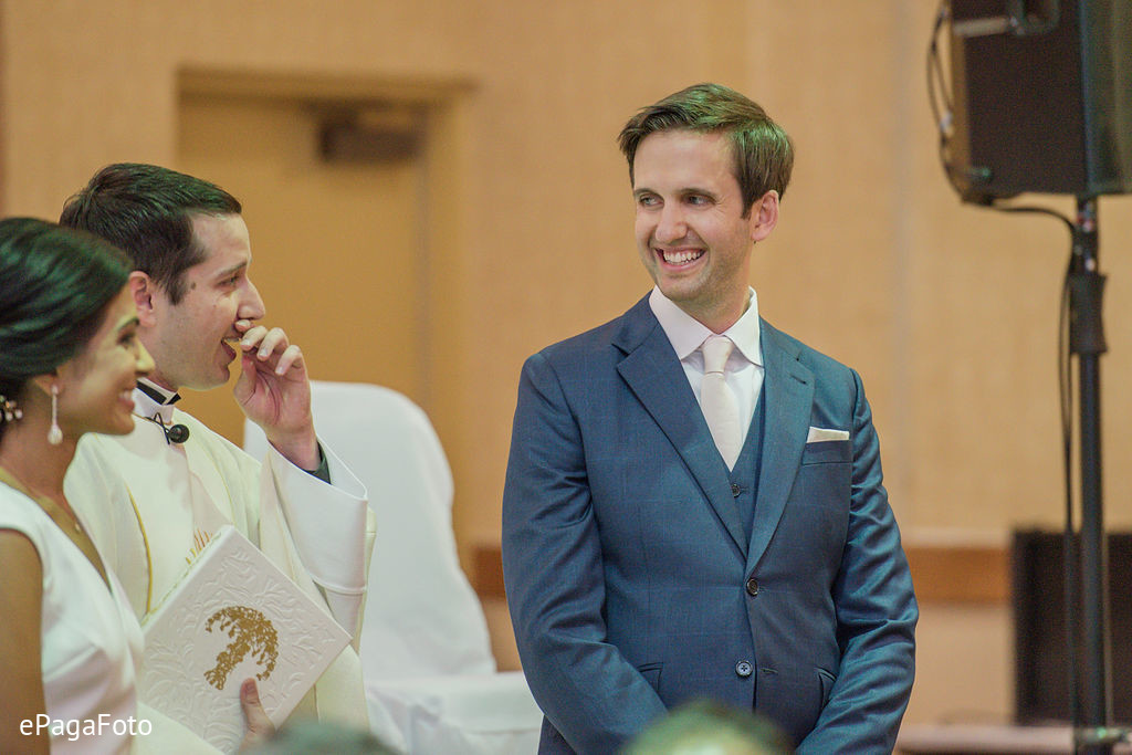 Joyful Indian groom with Indian bride at their wedding ceremony ...