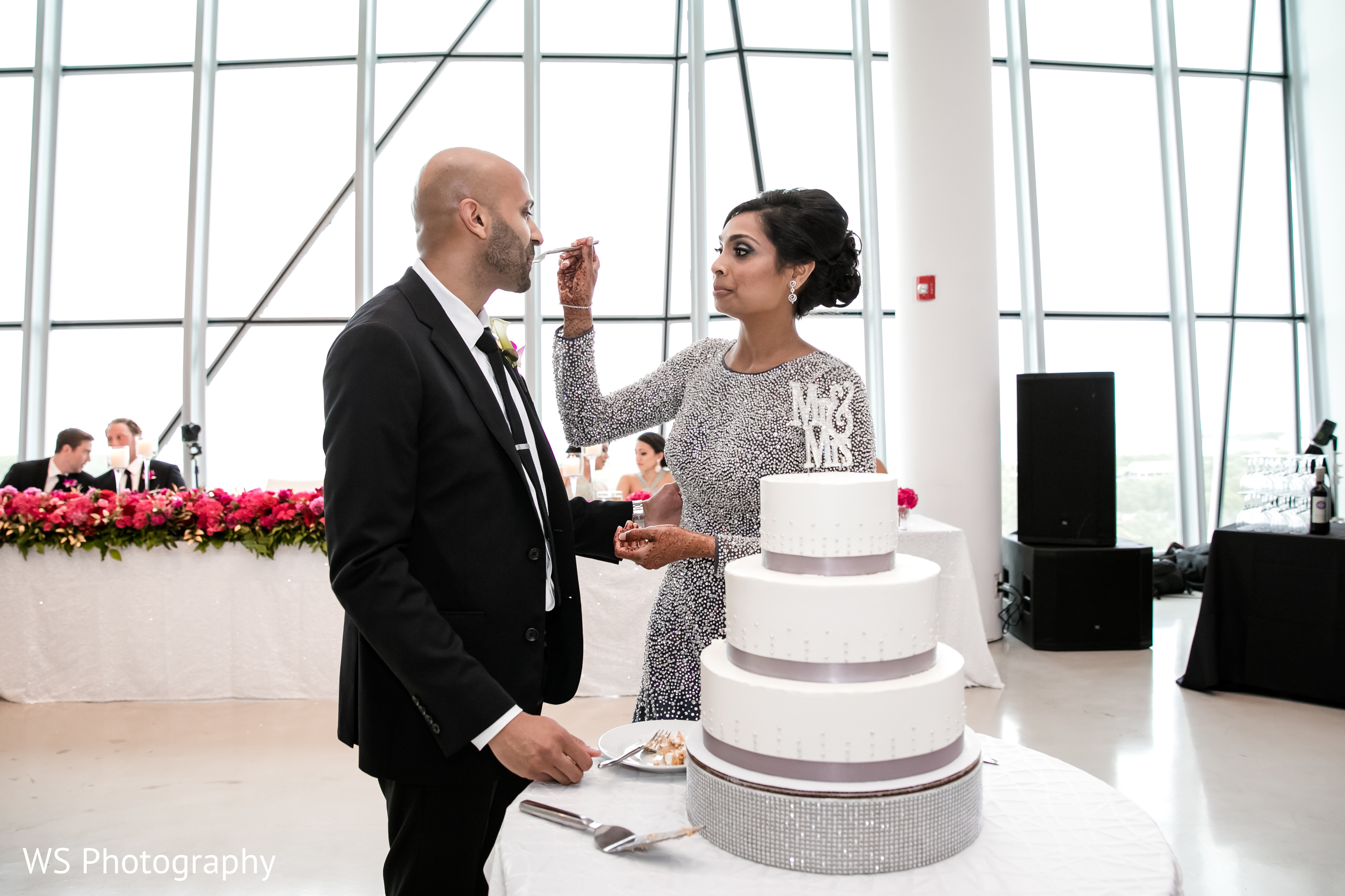 Indian bride giving cake to the groom lovely capture. | Photo 194501