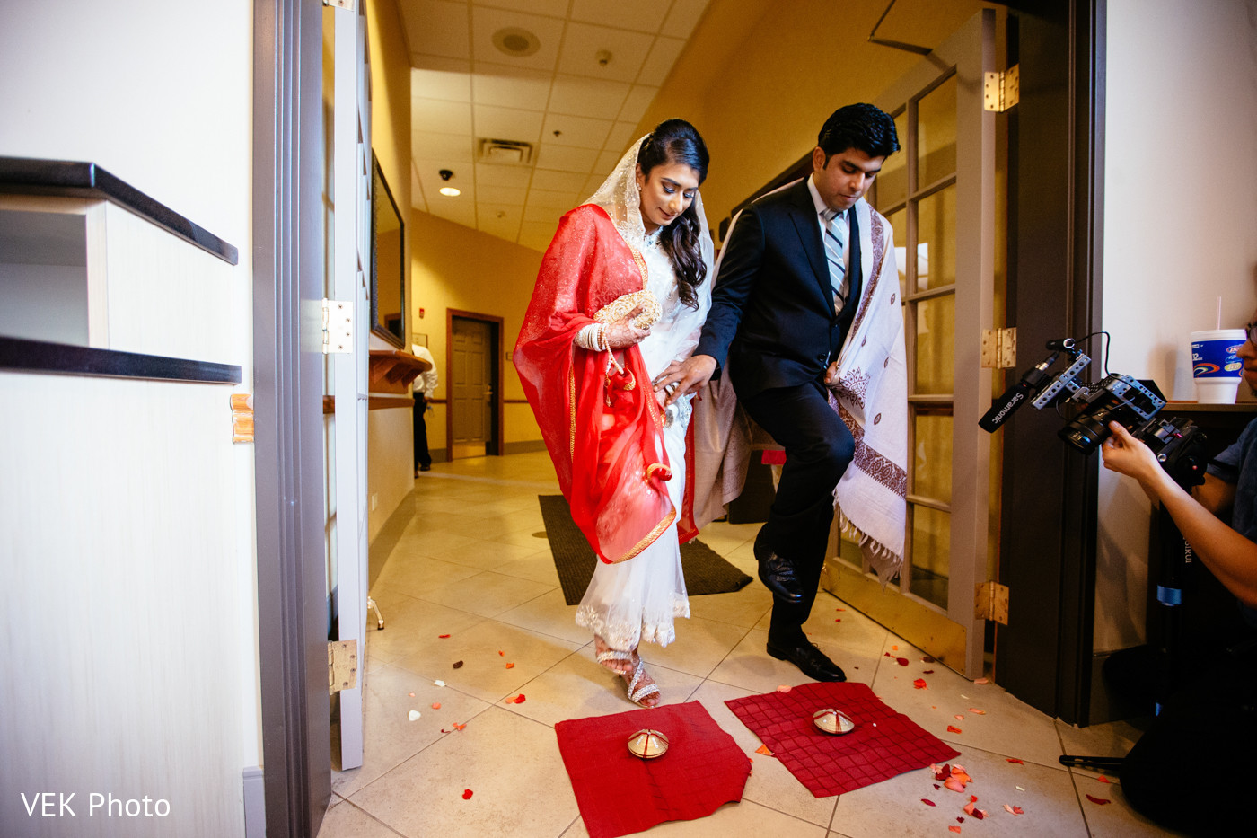 Indian bride and groom when stepping on nuts. | Photo 195254