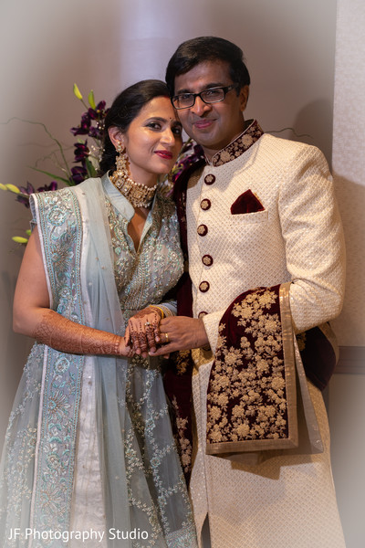 Magnificent Indian bride and groom reception outfits. | Photo 213104