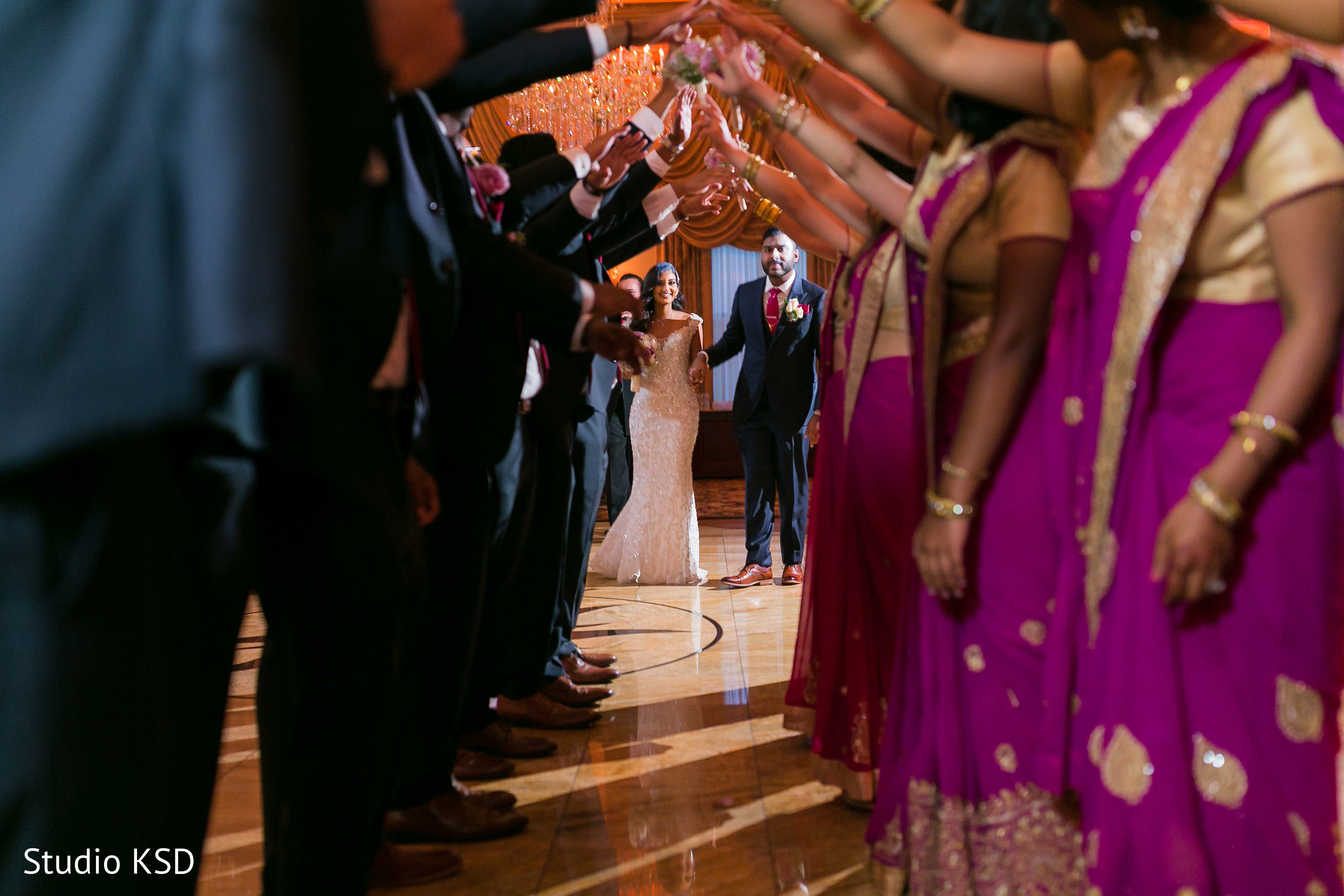Ravishing Indian bride and groom entrance to wedding reception. | Photo ...