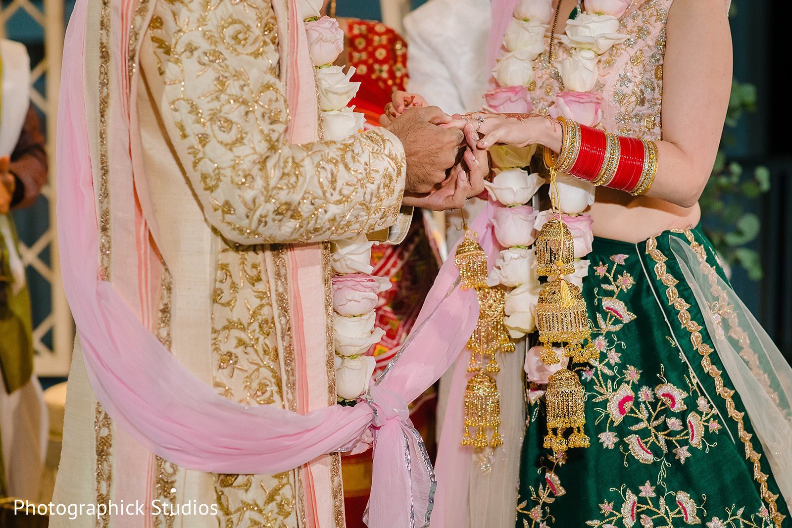 Indian bride and groom during ring exchange ritual. | Photo 219453
