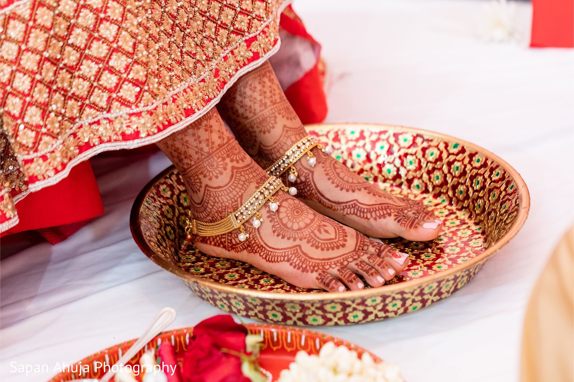 Washing Indian bridal foot with water ritual. | Photo 226858