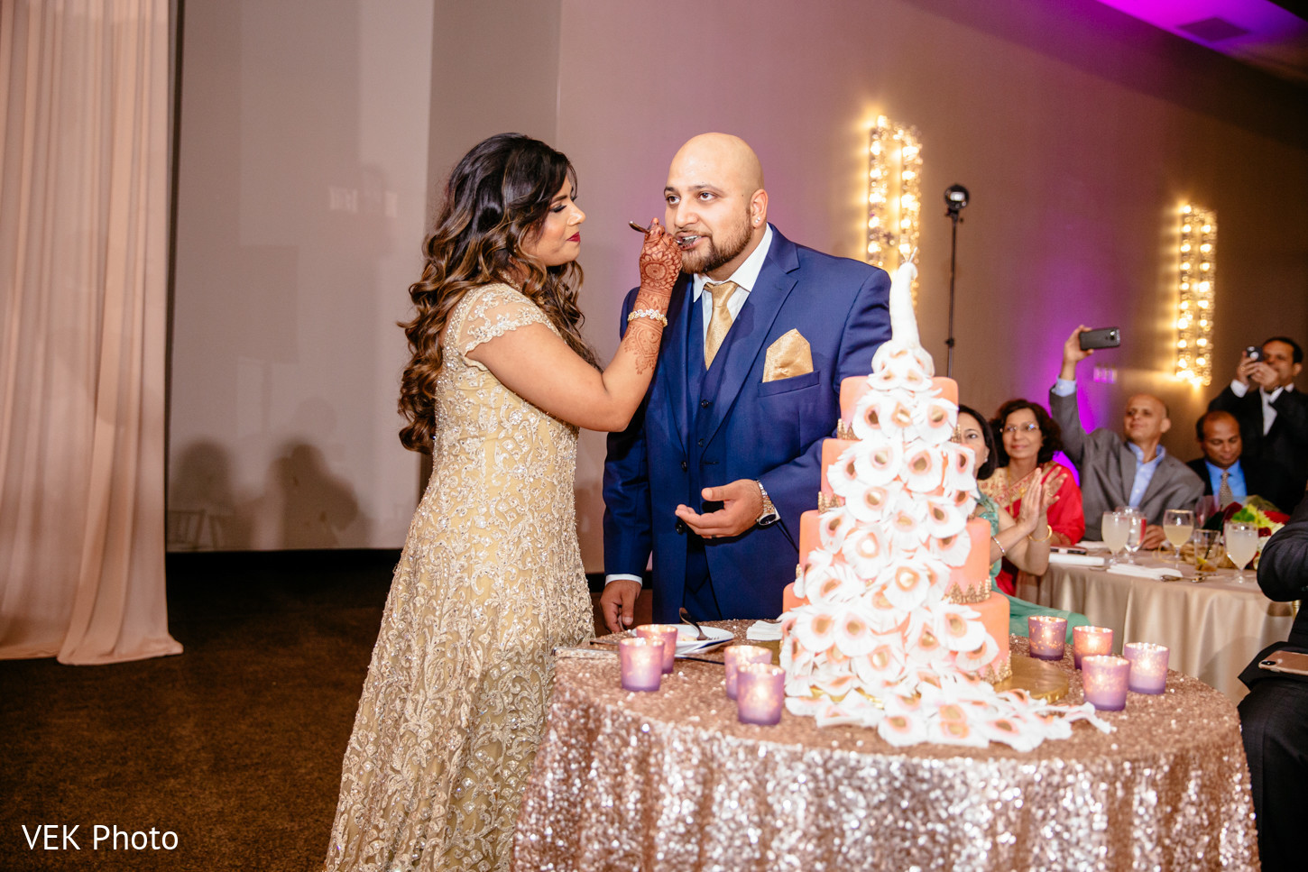 Indian bride giving cake to the groom lovely capture. | Photo 228397