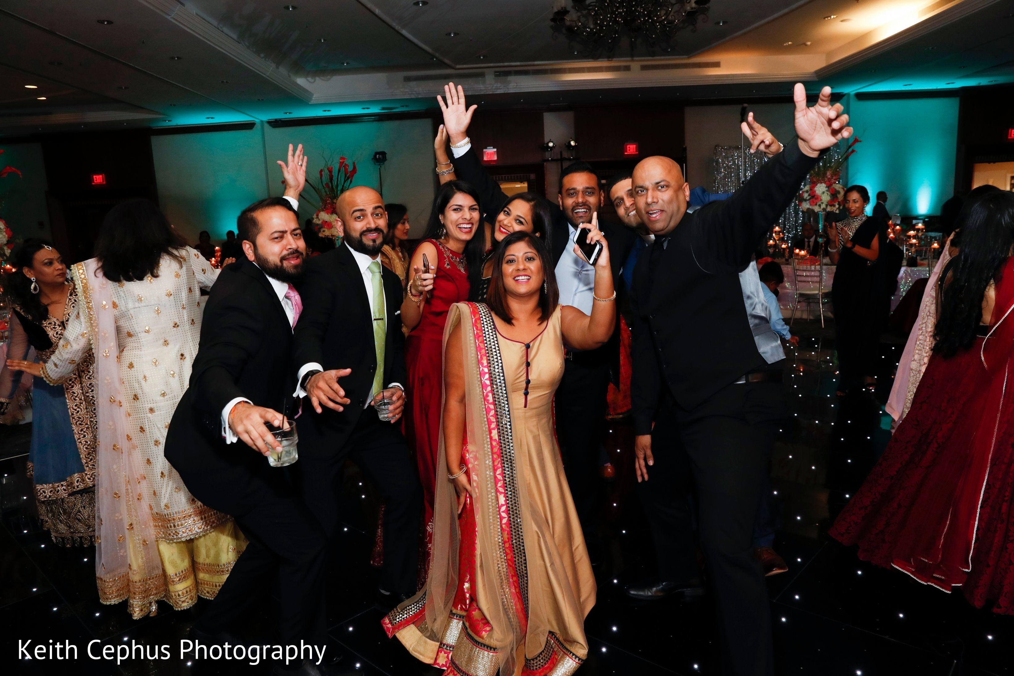Indian wedding guests posing for photo. | Photo 232205