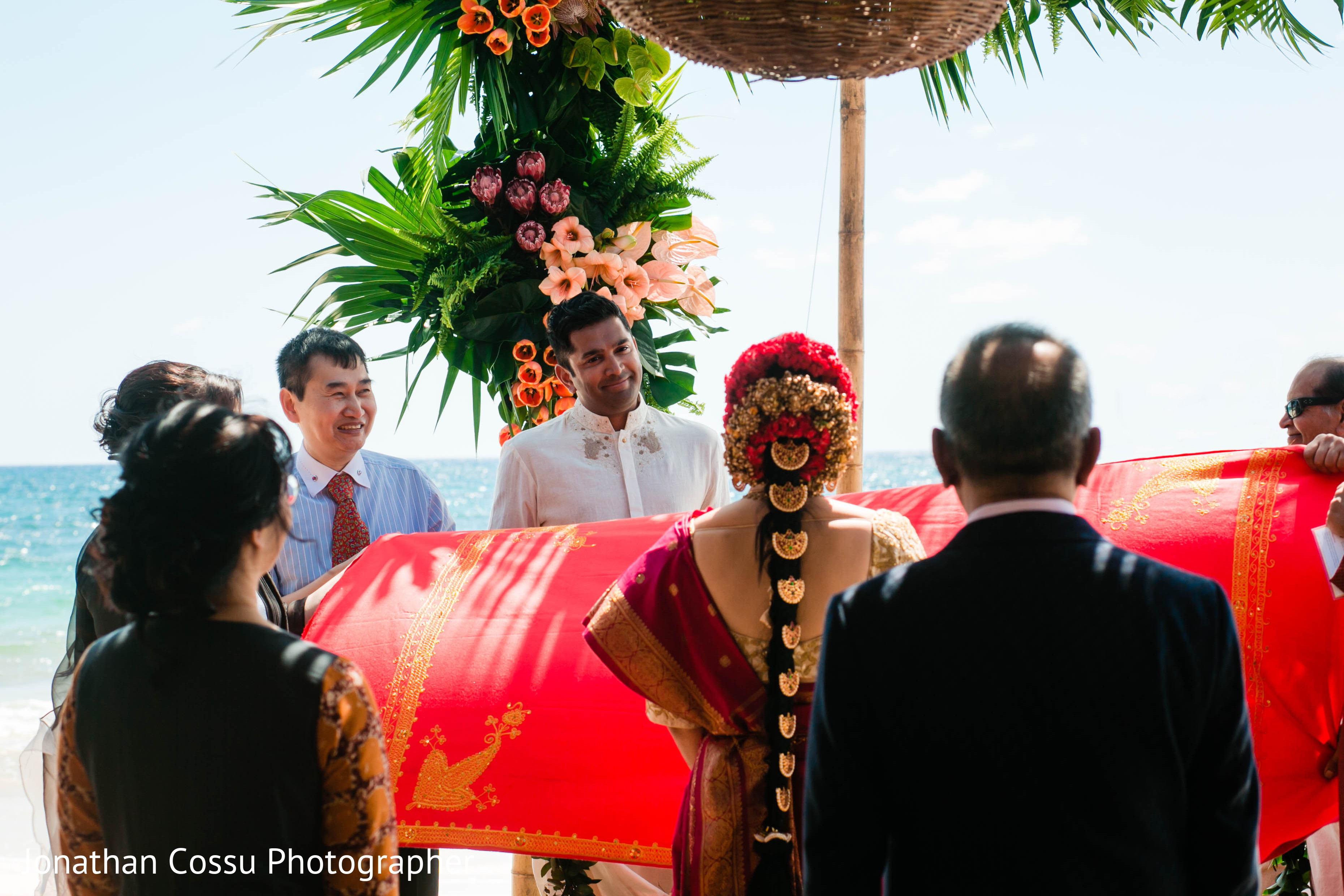 Indian groom being uncovered from antarpat to see his bride. | Photo 233483