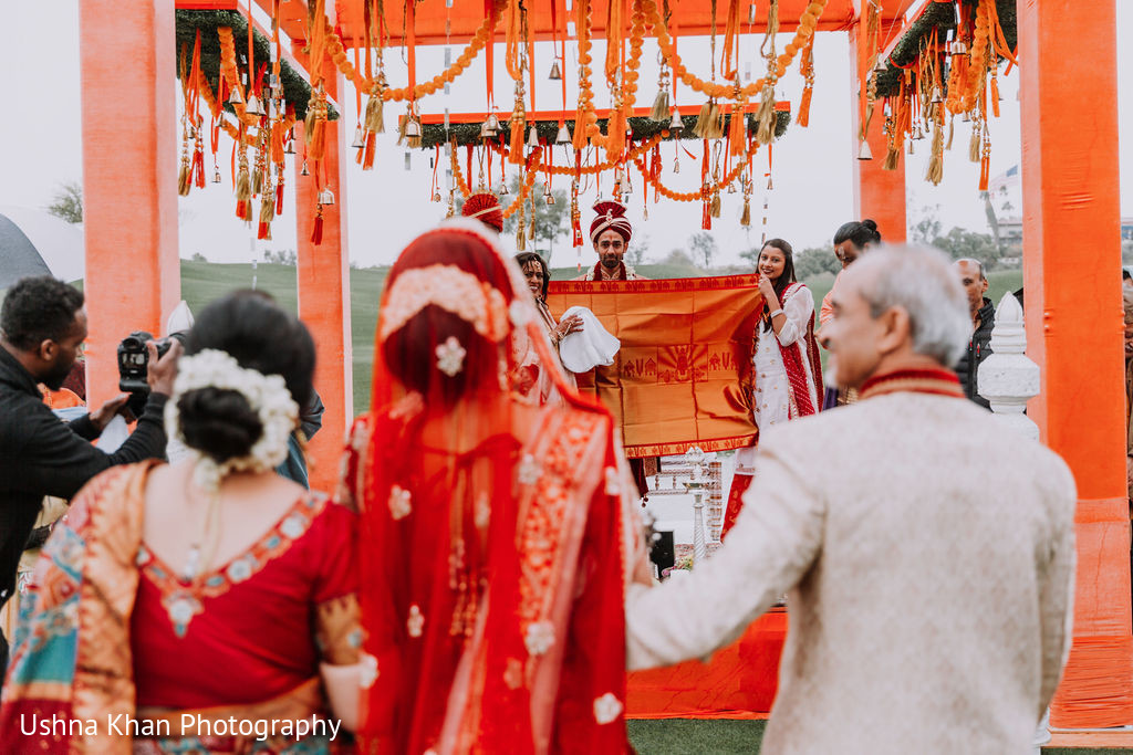 Indian groom covered with antarpat at mandap. | Photo 240319