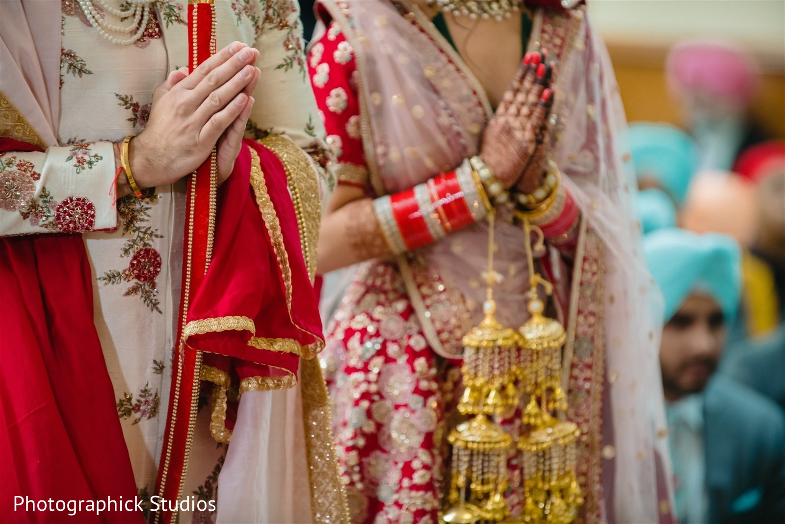 Indian bride and Indian groom praying at their ceremony. | Photo 244423