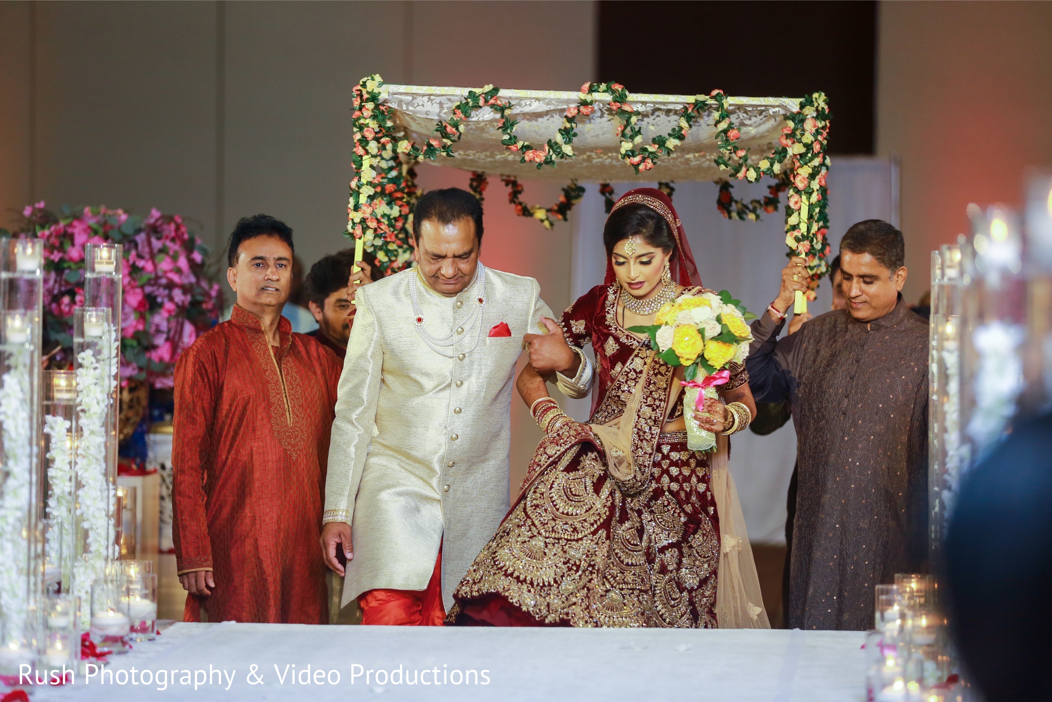 Indian bride walking with father at ceremony aisle. | Photo 250182
