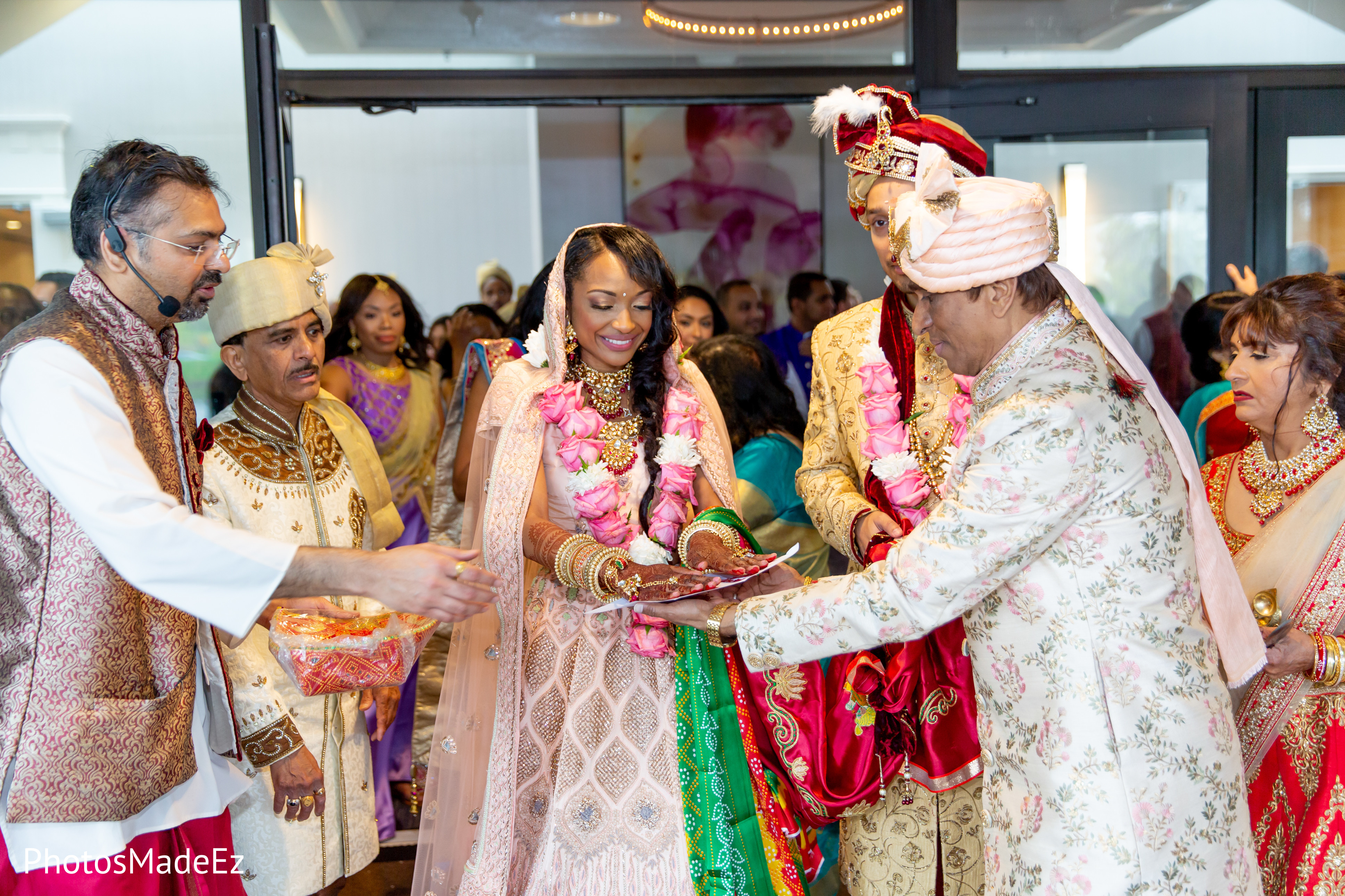 Maharani putting her red marked hands on paper ritual. | Photo 252292