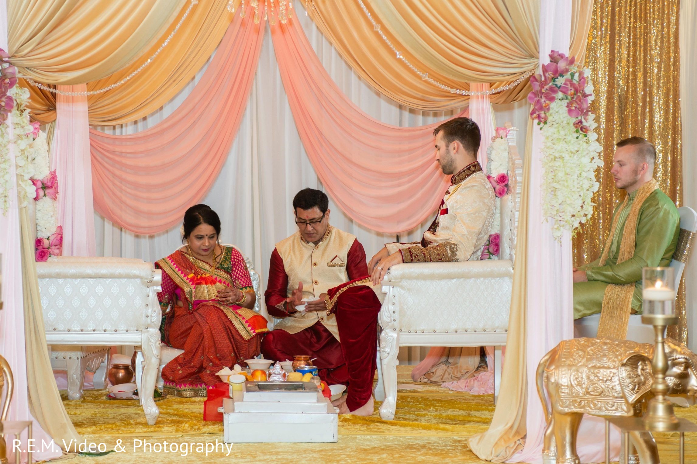 Indian bridal parents with Indian groom during the Dwar Puja. | Photo ...