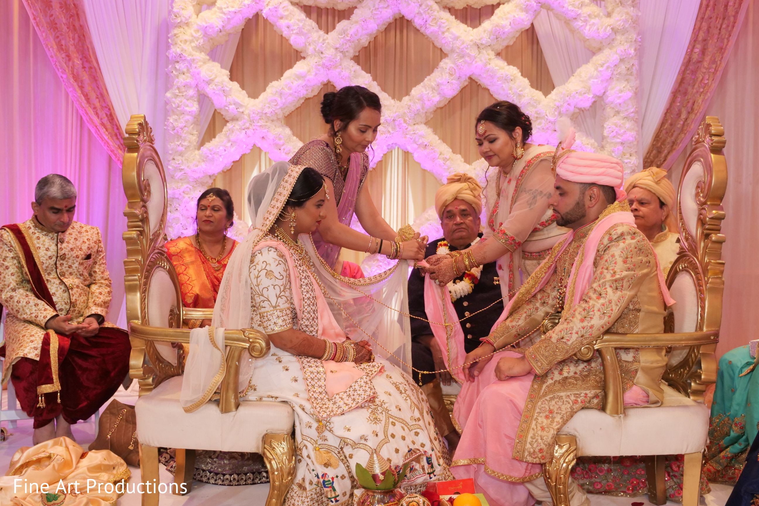 Maharani wearing the ivory bridal saree during the ceremony. | Photo 257819