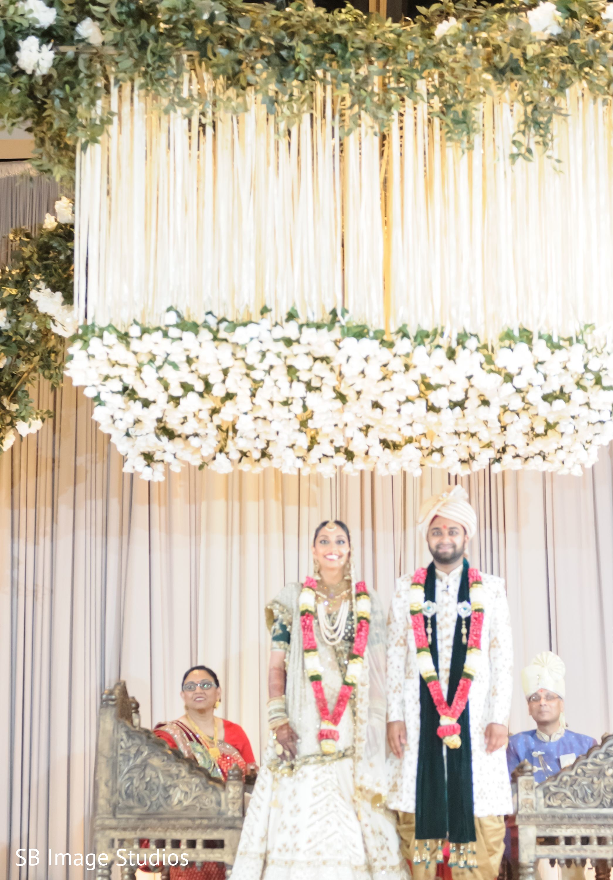 Joyful couple just married posing at mandap. | Photo 262446