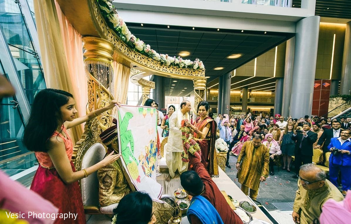 Antarpaat, a curtain is put between Indian bride and Indian groom ...