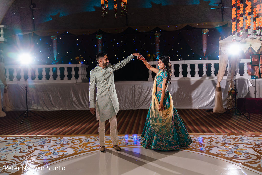 Indian couple at their sangeet dance capture. | Photo 264489