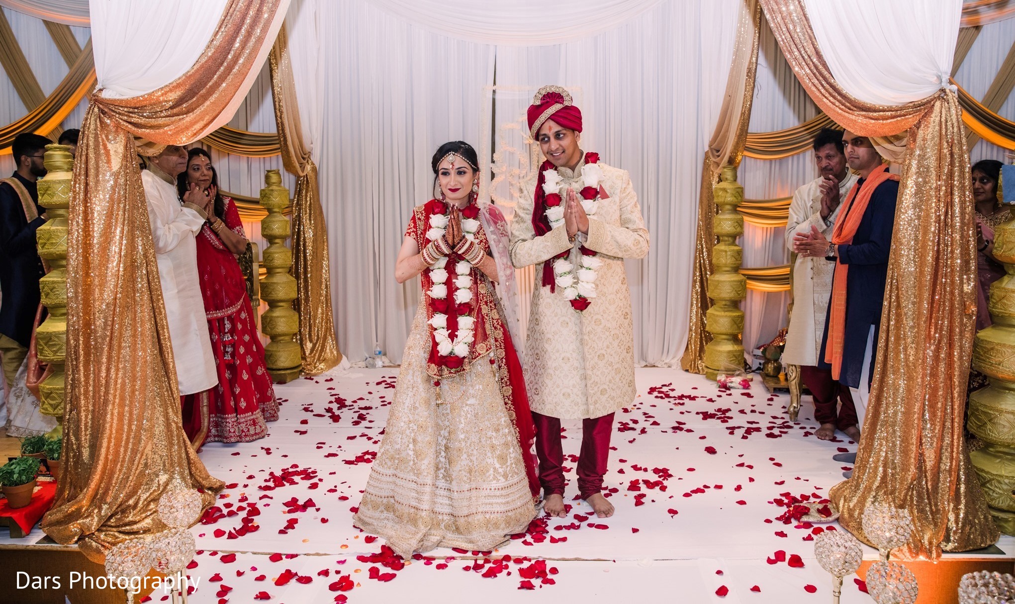 Indian bride and groom praying during their wedding ceremony. | Photo ...
