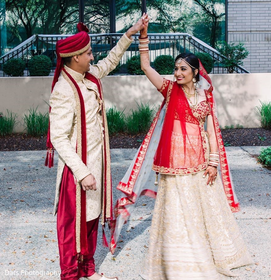 Indian bride and groom at their first look photo. | Photo 265447