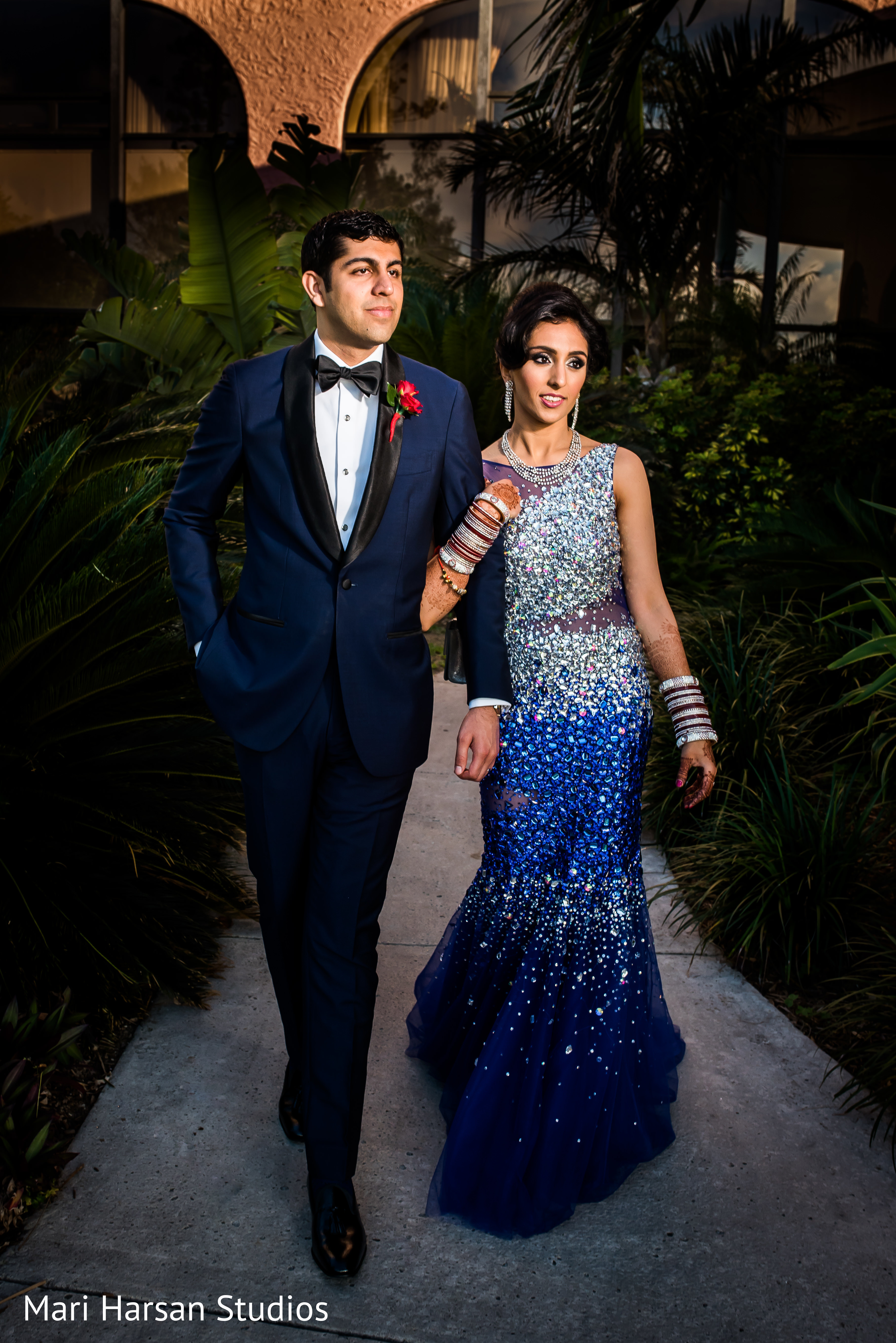 Glamorous indian bride and groom in blue reception outfits. | Photo 80652
